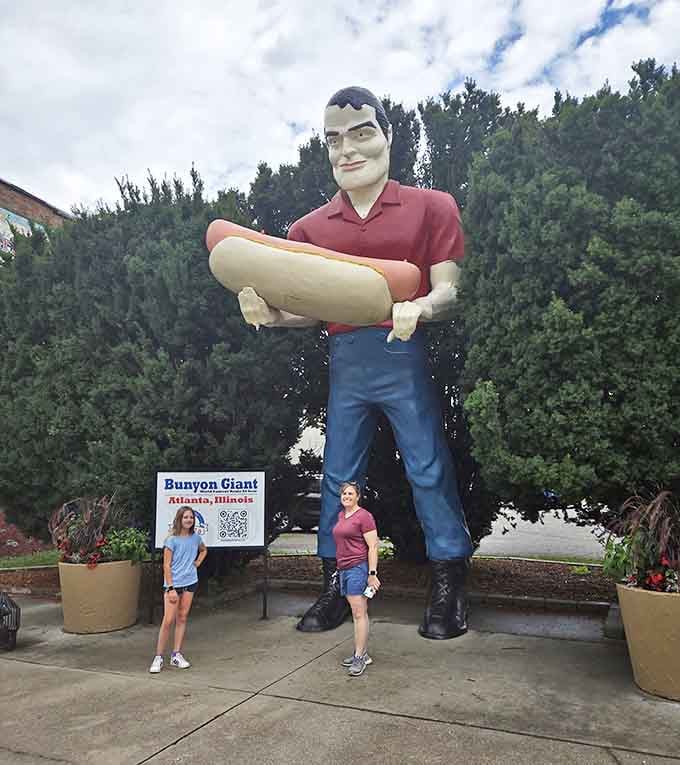 Family photos with the giant become treasured vacation memories, with everyone looking ant-sized next to their fiberglass host.