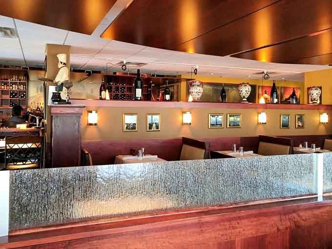 The dining room's thoughtful layout ensures everyone gets their own space, because nothing ruins a great steak like overhearing someone else's entire life story.