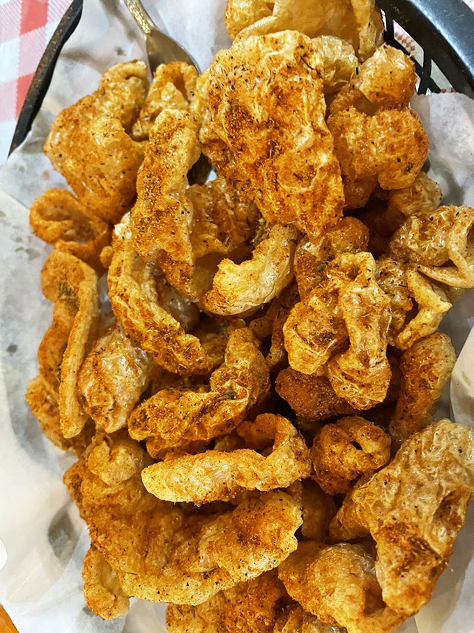 Crispy, seasoned perfection! These house-made pork rinds shatter with each bite, delivering a flavor explosion that store-bought can't touch.