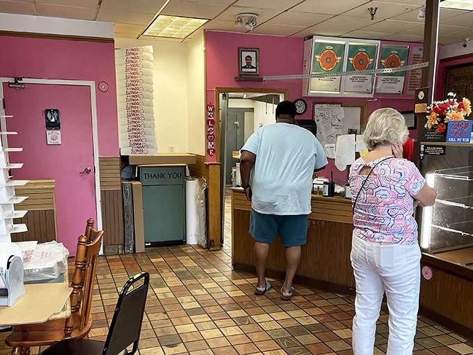The daily ritual &ndash; locals lining up for their fix of freshly-made delights that put chain donuts to shame.