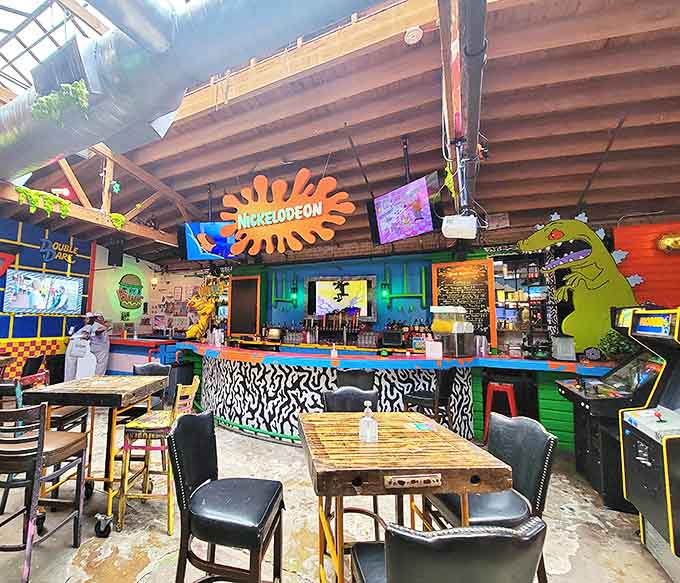 The Nickelodeon-themed bar area bursts with cartoon colors and childhood memories, serving adult beverages in an environment that makes you feel delightfully underage again.