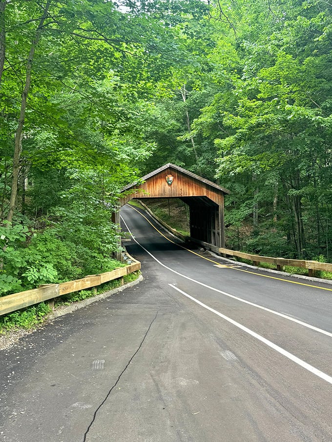 The covered bridge in summer green offers a completely different mood than its autumn persona &ndash; same character, different costume.