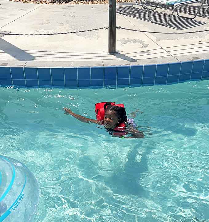 Water wings and wide smiles&mdash;the universal language of summer fun. This little swimmer's joy is absolutely contagious through the screen.