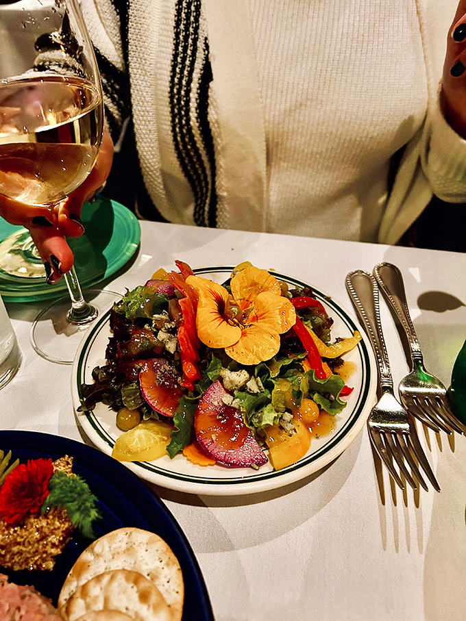 Eating the rainbow never looked so good – this salad, bursting with color and topped with edible flowers, celebrates Vermont's seasonal bounty.