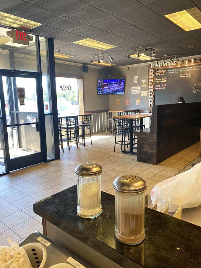 The dining area strikes that perfect balance between "come as you are" casual and "we're serious about our BBQ" authenticity.