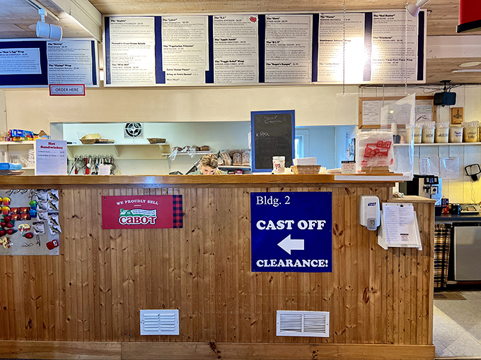 Another view of the deli counter where hungry customers place their orders &ndash; notice the wooden details that maintain the store's historic character.