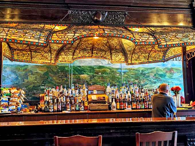 Shute's Saloon's spectacular stained glass canopy and hand-painted mural transport patrons to the elegant barrooms of the early 1900s.