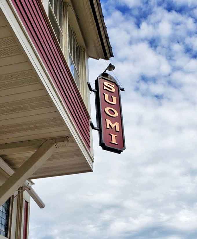 The simple "SUOMI" sign against Michigan's sky promises authentic Finnish flavors without fanfare – just honest, delicious tradition.