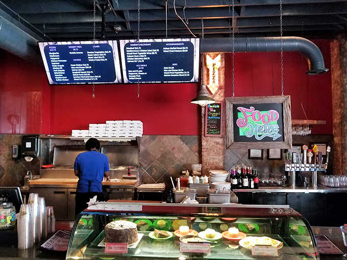 Digital menu boards and efficient layout show a kitchen that's ready to handle the crowds that inevitably show up for this caliber of food.