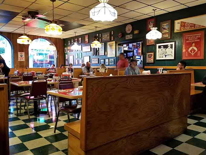 Vintage lighting and cozy booths create an atmosphere that invites you to slow down and actually enjoy your meal.