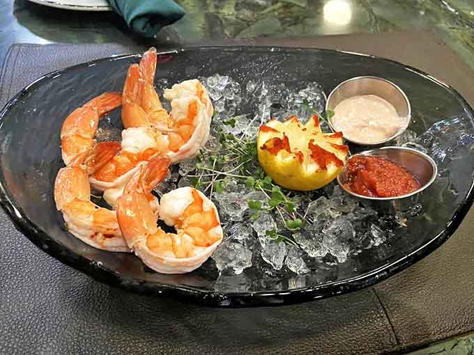 Jumbo shrimp cocktail arrives on a bed of ice, accompanied by zesty sauces that wake up your taste buds for what's to come.