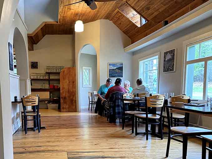 The vaulted ceilings and abundant natural light create an airy, spacious feel that somehow still manages to be cozy and intimate for every meal.