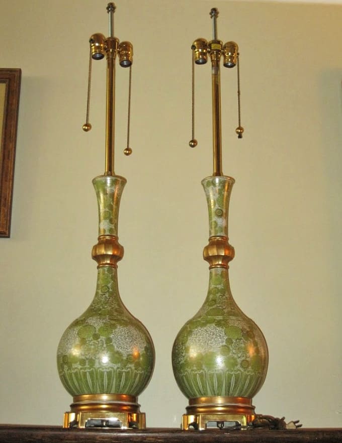 Hollywood Regency lamps standing tall and proud, ready to add instant glamour to any room that's lacking in dramatic flair.