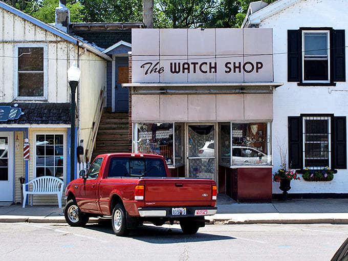 The Watch Shop's vintage signage reminds us that some things, like good service and craftsmanship, never go out of style.