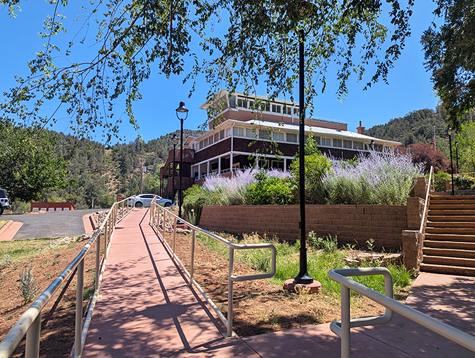 Tonto Natural Bridge Visitor Center serves as gateway to Arizona's most impressive limestone arch, nature's own cathedral.