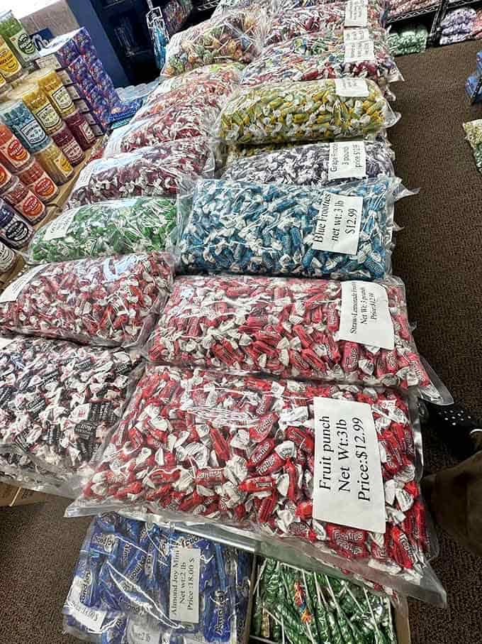 Tootsie Roll Frooties lined up like colorful soldiers – each bag a battalion of flavor ready to deploy happiness one chewy bite at a time.