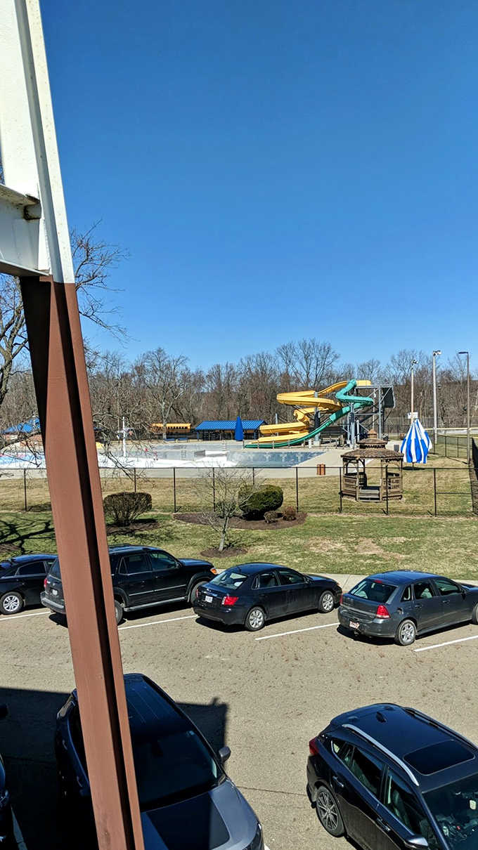 Even the parking lot offers a tantalizing glimpse of watery fun, those yellow and green slides practically screaming "hurry up!"