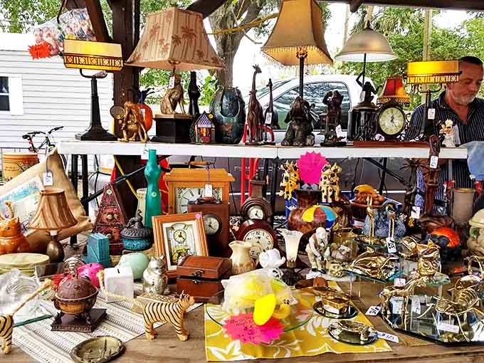 A collector's fever dream&mdash;vintage lamps, figurines, and curiosities creating a miniature museum where each piece whispers, "Take me home!"