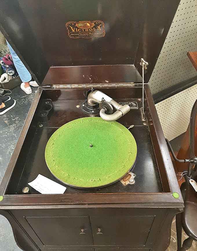 This Victrola record player with its green felt turntable once filled someone's living room with scratchy melodies&mdash;now it waits for its next performance.