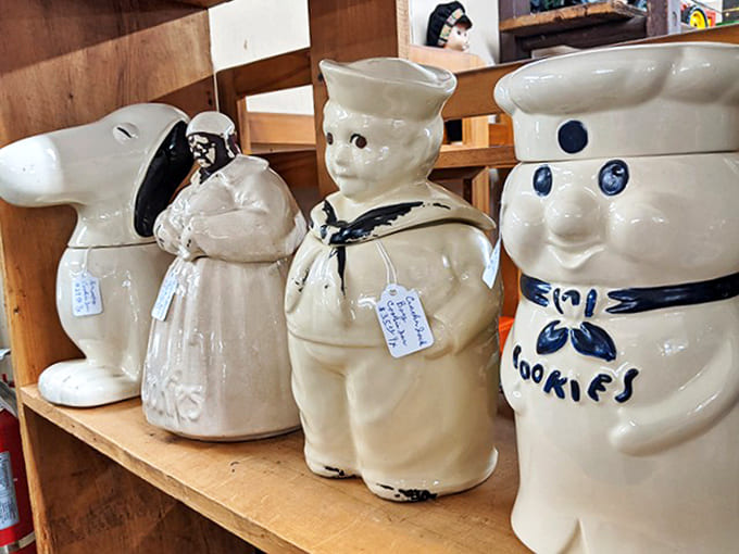 These ceramic cookie jar characters smile with that slightly unsettling cheerfulness that only mid-century kitchenware could pull off so perfectly.