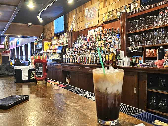 A well-stocked bar promises the perfect beverage pairing for those legendary wings. The bartenders remember regulars' orders without asking.