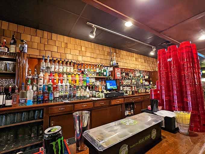 That well-stocked bar with its impressive bottle collection and stacks of red cups means business, even during the breakfast hours.