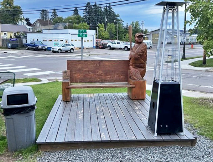Wooden Statue Bench: A carved wooden bench offers the perfect photo opportunity, though your ice cream might not survive the Instagram session.