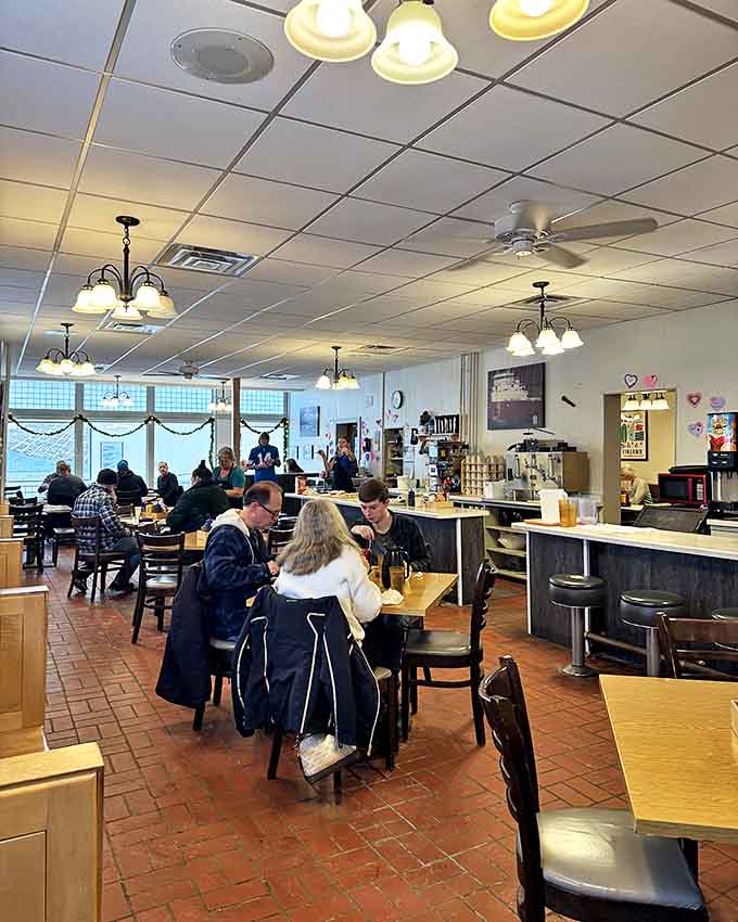 From another angle, you can see the efficient counter service area where magic happens beneath simple lighting and practical d&eacute;cor.