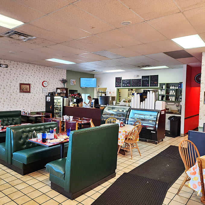 Classic diner booths in that perfect shade of green invite you to settle in for a meal that feels both nostalgic and fresh.