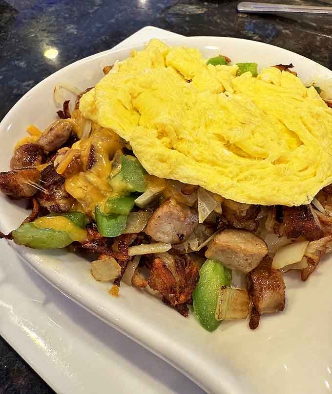 The breakfast skillet &ndash; where eggs, cheese, and perfectly seasoned potatoes unite to create morning magic that could fuel an entire day.