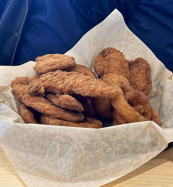 Chicken tenders that redefine the category&mdash;crispy, juicy, and stacked high enough to make you question your ability to finish them.