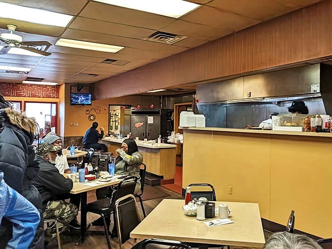 The counter offers front-row seats to the breakfast show, where regulars exchange news while waiting for their usual orders.