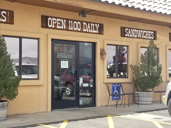 The entrance promises three essential food groups &ndash; burgers, sandwiches, and "open daily" &ndash; the universal language of good eating.