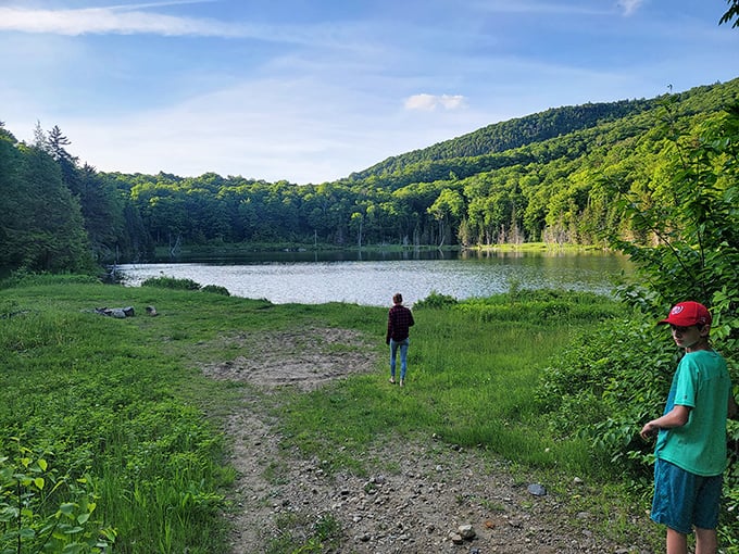 Young explorers discover the magic of a hidden pond near the main lake, where adventure awaits around every corner.