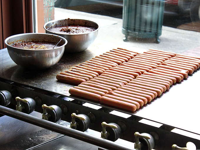 Rows of hot dogs sizzling on the grill alongside pots of the legendary meat sauce &ndash; a scene that has played out thousands of times in this Kalamazoo institution.
