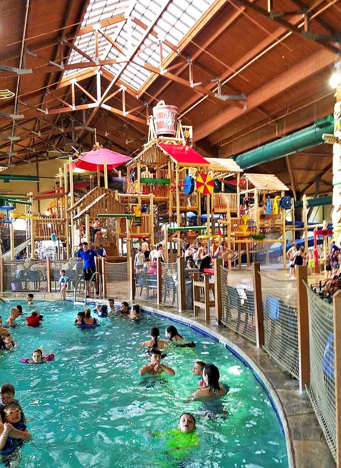 The indoor water playground buzzes with activity as families splash, slide and create the kind of memories that survive long after the sunburn fades.