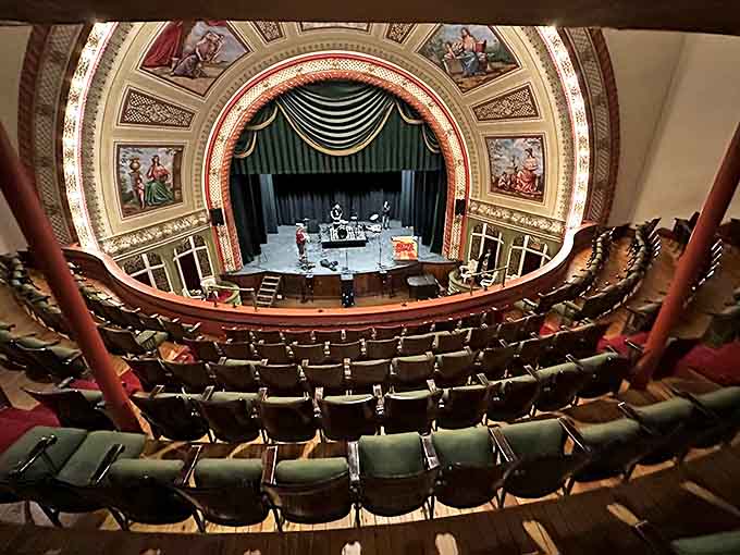 The ornate ceiling and gilded balconies of this historic theater transported miners from their underground toil to worlds of imagination.