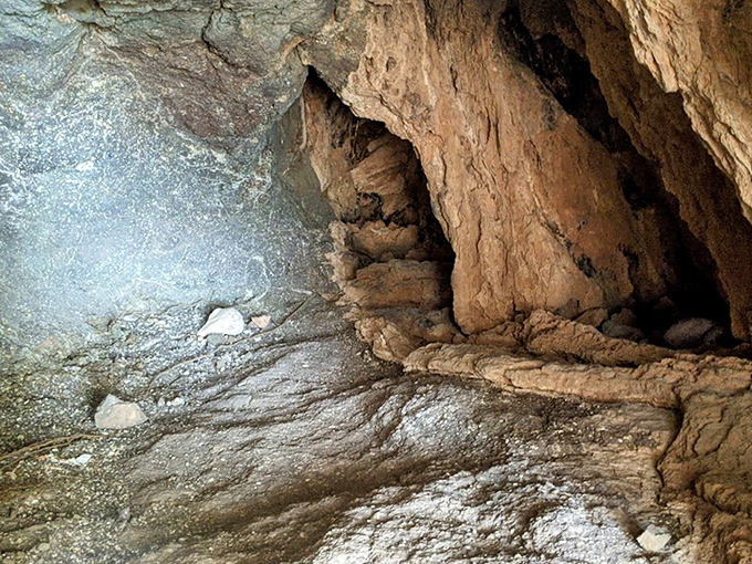 Inside the cave's cool embrace: Step into nature's air conditioning &ndash; a limestone sanctuary where temperature drops and imagination soars.