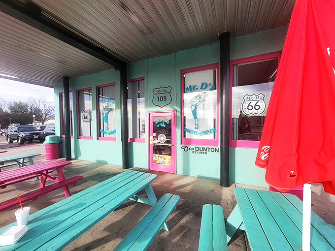 Turquoise picnic tables offer al fresco dining with a side of people-watching and the occasional rumble of passing motorcycles.