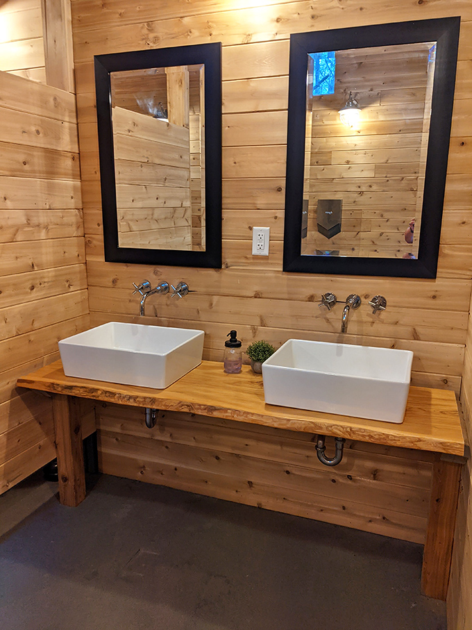 Even the washrooms embrace rustic elegance with vessel sinks on live-edge counters &ndash; proving attention to detail extends to every corner of this attraction.