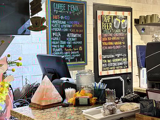The counter tells its own story with colorful chalkboard menus, crystal accents, and the promise of both caffeine and craft beer adventures.