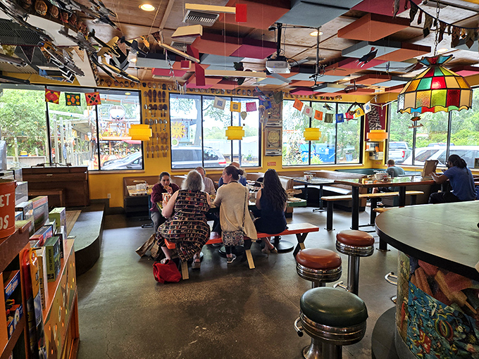 The dining area buzzes with conversation and laughter, proving Satchel's is as much about community as it is about incredible pizza.