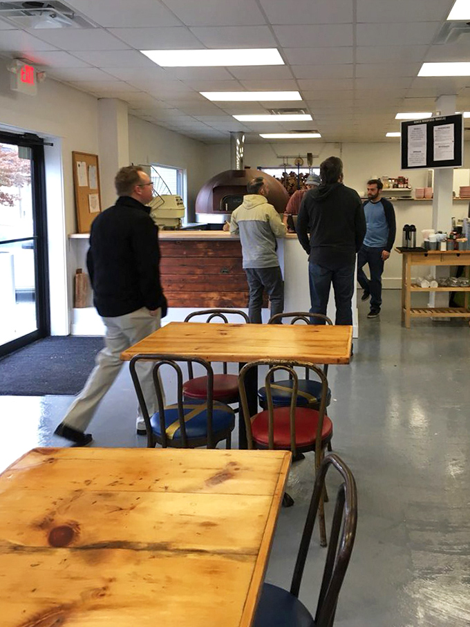 Simple wooden tables invite you to sit, stay, and savor &ndash; because bagels this good deserve your full attention.
