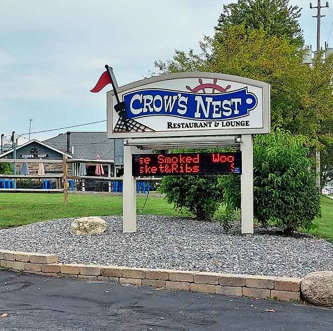 The roadside welcome sign ensures travelers know they've arrived at a truly unique Maine destination.