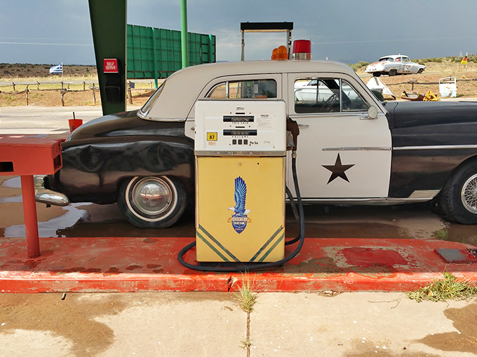 This vintage police car looks ready to issue speeding tickets to anyone rushing past this Route 66 gem.