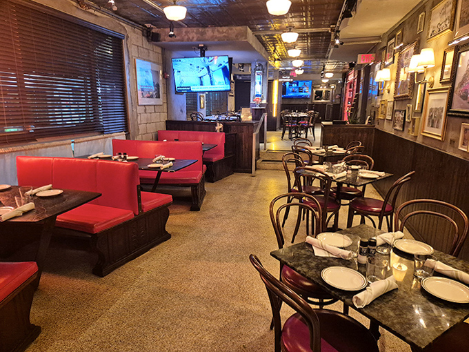 Tables arranged with thoughtful spacing create intimate islands for conversation, while bentwood chairs add a touch of European café charm to this Miami Beach institution.