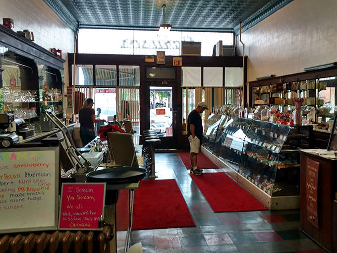 The interior view reveals Caruso's true charm &ndash; not just a candy store but a community gathering place where conversations flow as freely as the fountain sodas.
