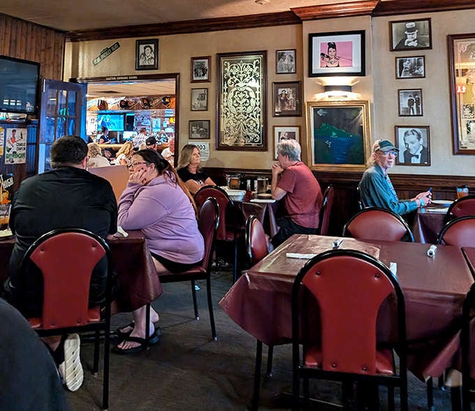 Diners enjoy the warm, community atmosphere that has made Luigi's a beloved gathering place for generations of Flint residents.
