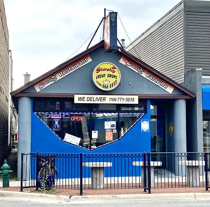 The distinctive triangular building of Starship Restaurant stands out on Madison Street with its blue exterior and cosmic theme that's truly out of this world.