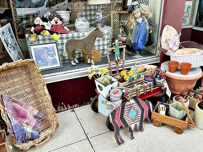 The shop window creates a charming vignette of nostalgia, featuring vintage toys arranged with the care of a museum curator with a playful heart.